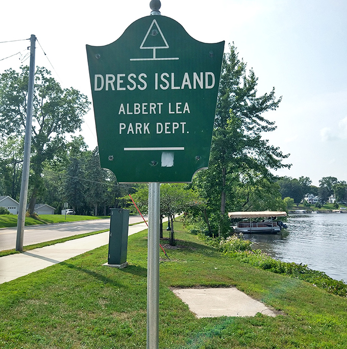 Dress Island's sign stands sentinel by the water, marking a spot where generations of Albert Lea residents have created summer memories.