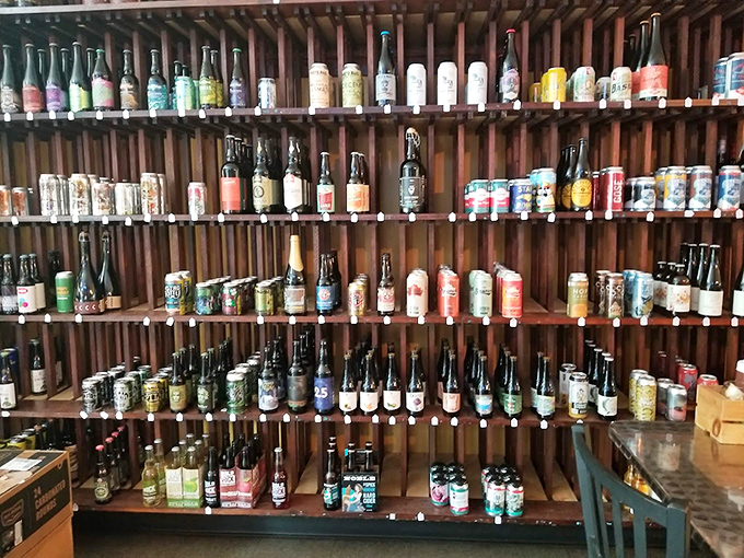 A wall of liquid possibilities&mdash;this impressive beer selection suggests someone here understands that variety isn't just the spice of life, it's the whole pantry.