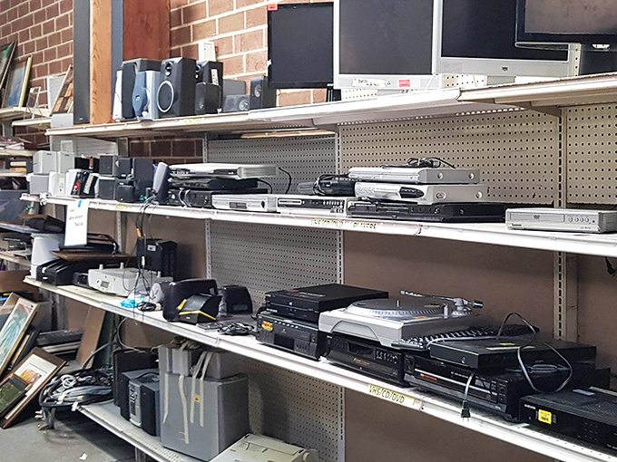 Electronic relics waiting for their second act. These shelves of DVD players and stereos aren't obsolete&mdash;they're vintage opportunities at pocket-change prices.