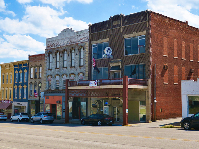 The Elks Lodge and its neighbors stand shoulder to shoulder, a lineup of architectural personalities from different eras finding common ground.