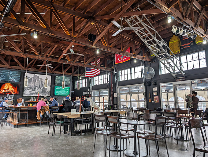 Engine 14 Brewery's industrial-chic interior combines exposed beams and American flags—the perfect backdrop for conversations that flow as freely as the craft beer.