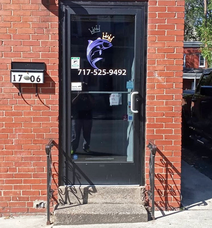 Even the entrance knows what's important&mdash;a crowned fish logo announcing you're about to enter seafood royalty territory.