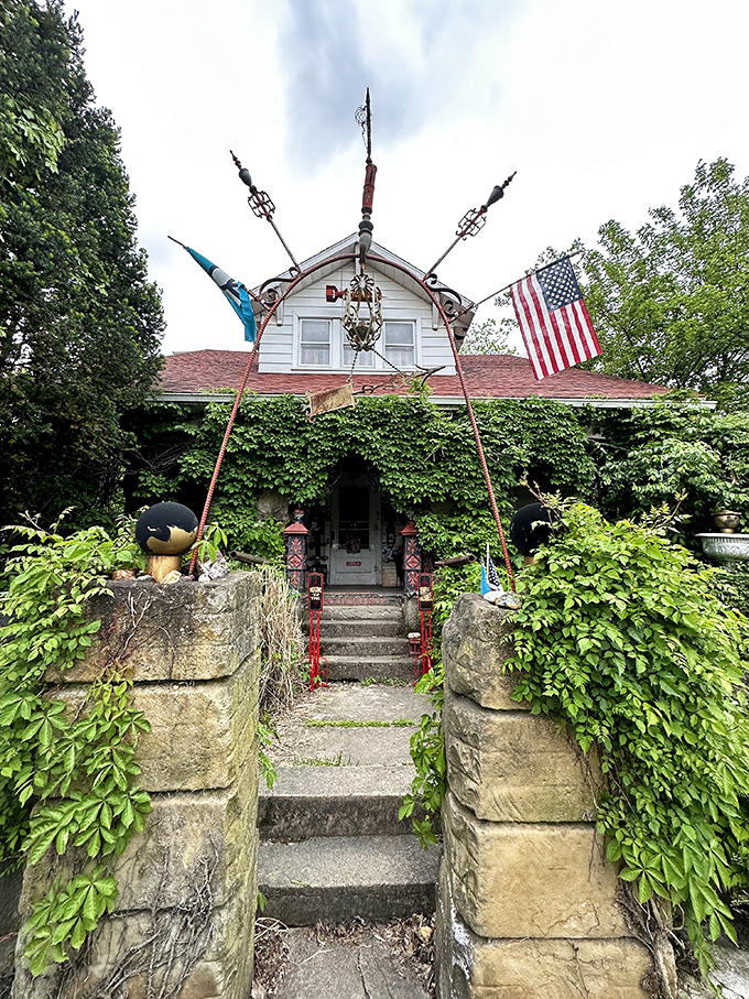 The home's entrance stands like a portal between worlds &ndash; ordinary suburban life on one side, stone-laden wonderland on the other.