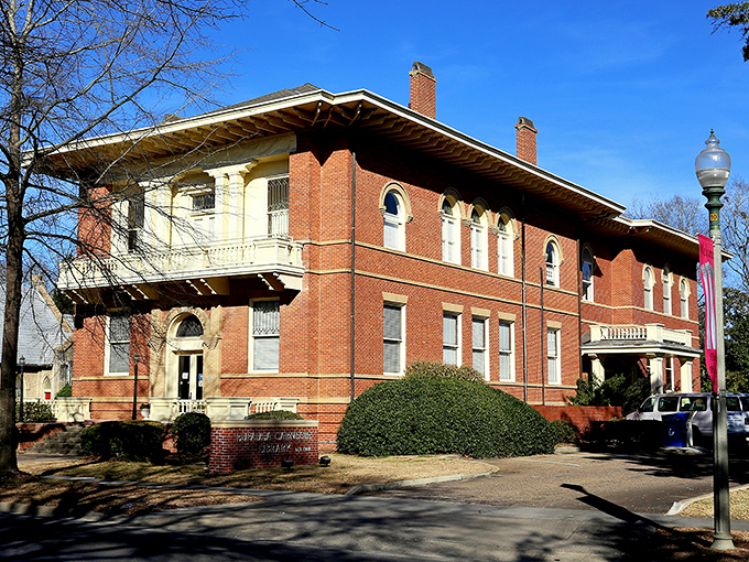 The Eufaula Carnegie Library combines brick solidity with architectural grace, offering literary escapes that cost nothing but return priceless memories.