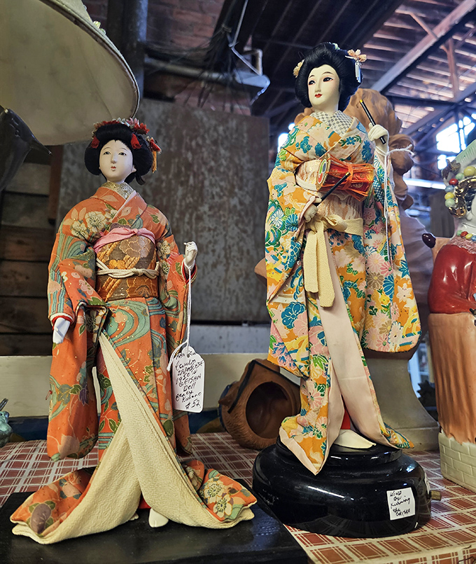Delicate Japanese figurines frozen in eternal grace, their silk kimonos and serene expressions offering a moment of zen amid the treasure hunt.