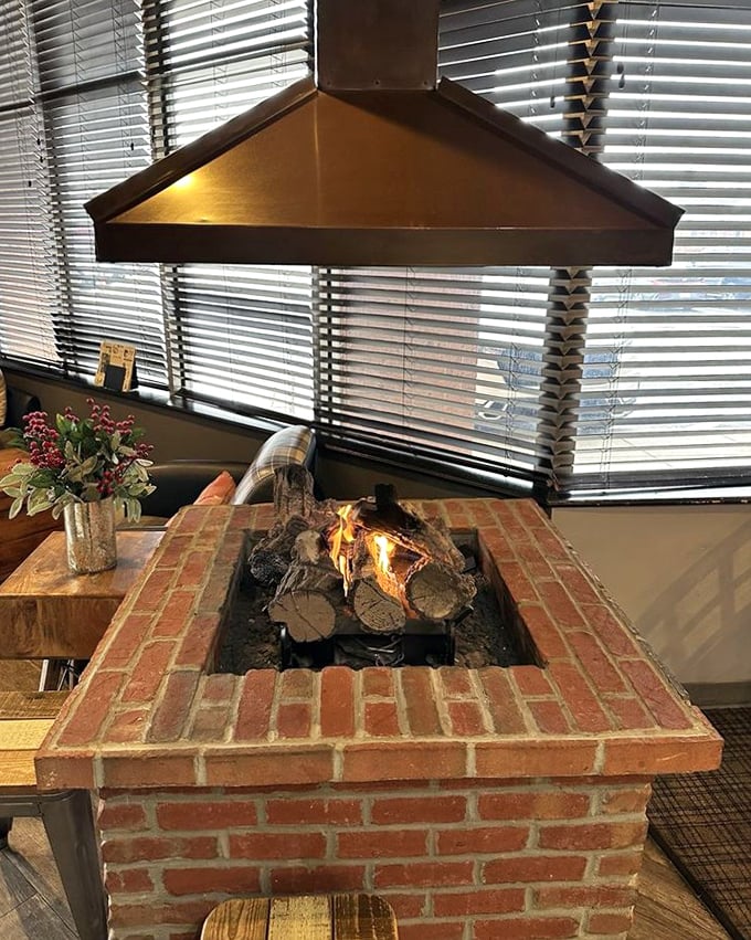 The indoor brick fireplace turns a regular meal into a special occasion. Nothing says "stay awhile" like the flicker of real flames.
