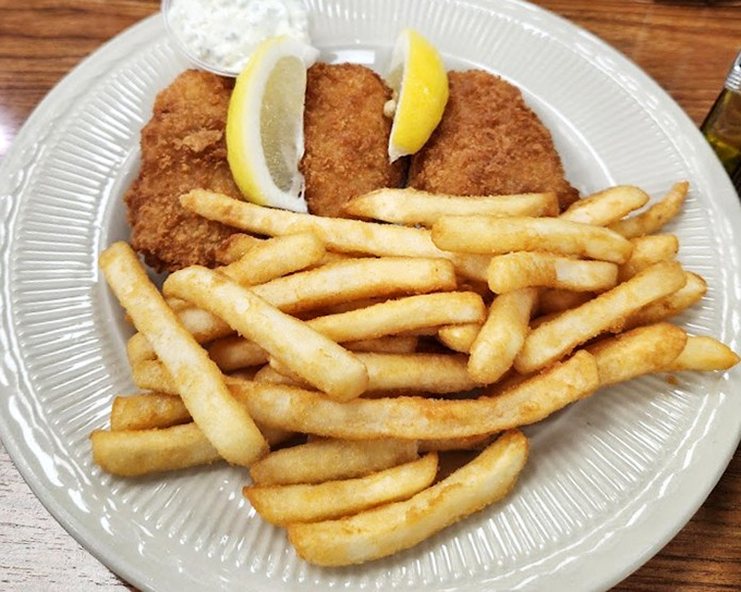 Fish and chips with a side of nostalgia. The kind of crispy, golden perfection that makes you wonder why you ever eat anything else.