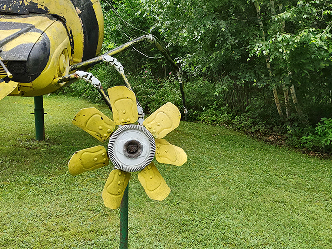 Even the flowers at Schaefer's Auto Art have mechanical roots. This metal bloom never wilts, catching sunlight instead of raindrops.