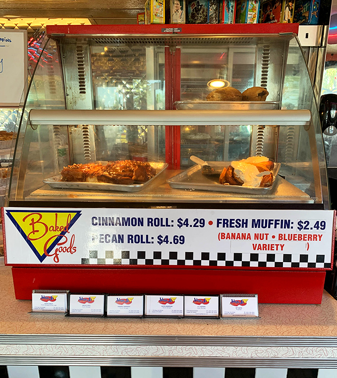 Behind glass cases, tomorrow's regrets masquerade as today's perfectly justifiable indulgences, each more tempting than the last.