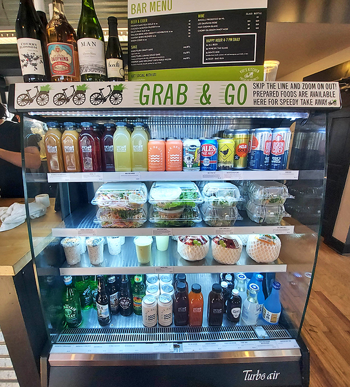 The grab-and-go cooler—a treasure chest of bottled delights and pre-packed meals for those times when your pho cravings can't wait.