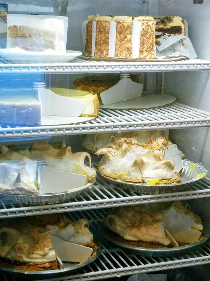 The dessert case – where willpower goes to die and "I'll just have coffee" turns into "Well, maybe just a slice of that pie."