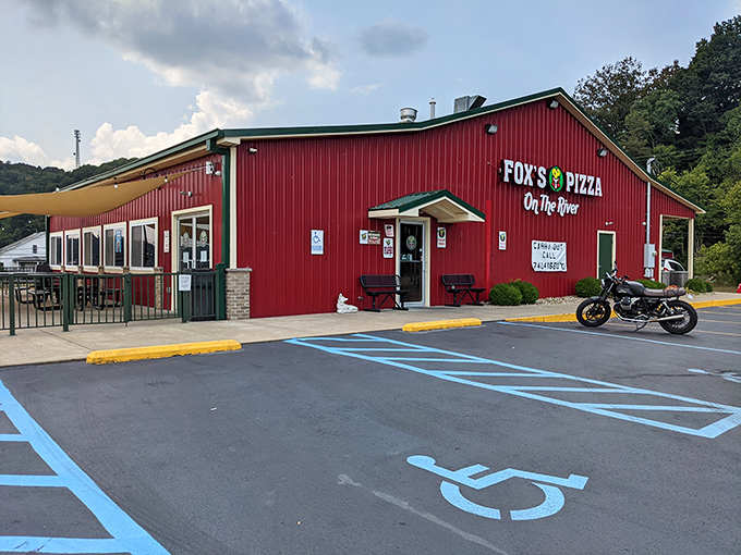 Fox's Pizza's bold red exterior makes no apologies for being exactly what it is&mdash;a beloved local pizza joint where river views come standard with your pepperoni.