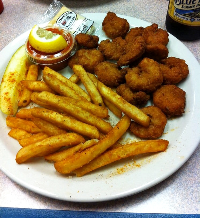 Fried shrimp and seasoned fries&mdash;the dynamic duo of seafood comfort that's been making bad days better since forever.