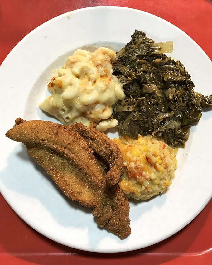 Crispy cornmeal-crusted catfish meets creamy mac and cheese and collards&mdash;the holy trinity of Southern comfort on a plate.