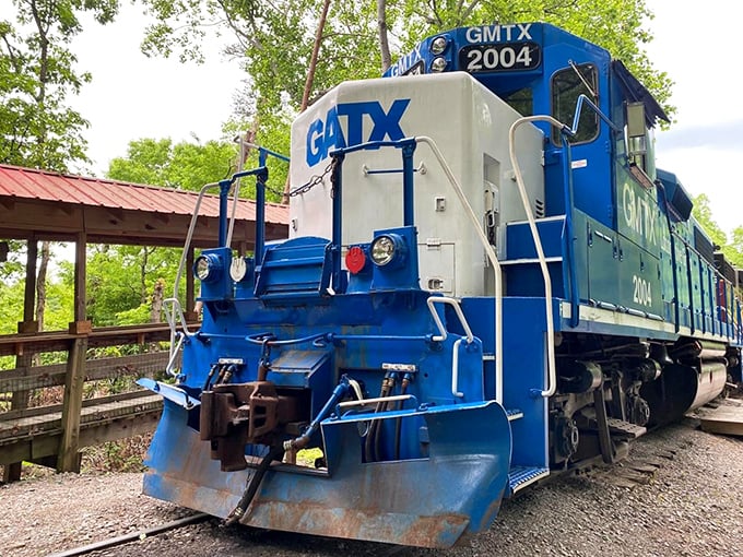 The bright blue GATX locomotive stands ready to pull passengers through some of America's most scenic terrain.