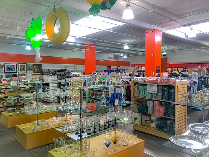 Crystal and glassware gleam under the lights, promising cocktail hours and dinner parties with vintage panache.