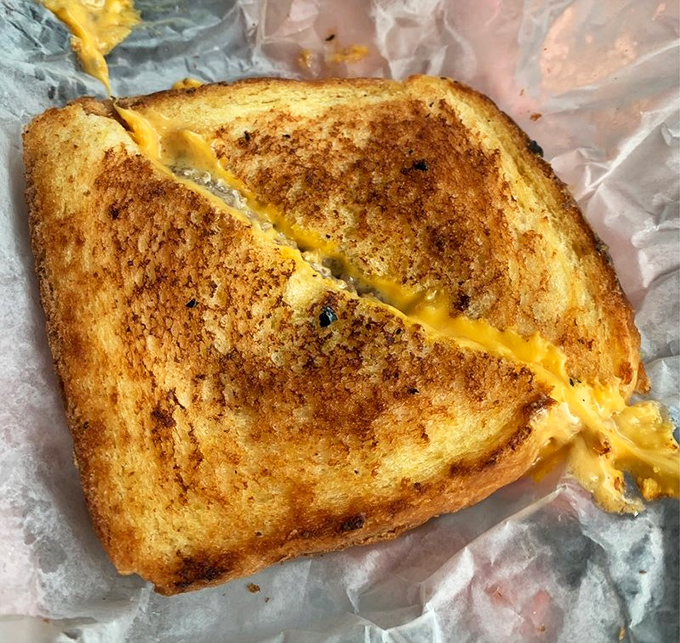 The grilled cheese at Mac's achieves that golden-brown perfection that makes you remember why you fell in love with this sandwich in the first place.
