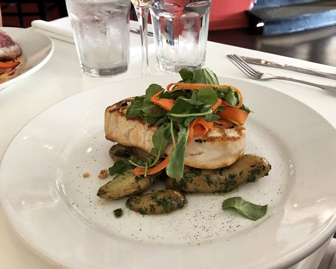 Swordfish that's having a spa day with fresh greens and fingerling potatoes. Simple, elegant, and impossibly fresh.