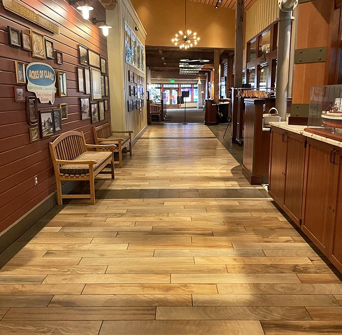 A hallway that whispers tales of decades of diners, its wooden floors polished by generations of seafood pilgrims.