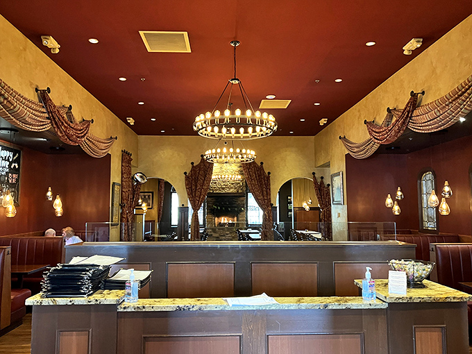 The host stand&mdash;first checkpoint on your journey to pasta paradise. Those framed photos tell stories of happy diners who came before you.