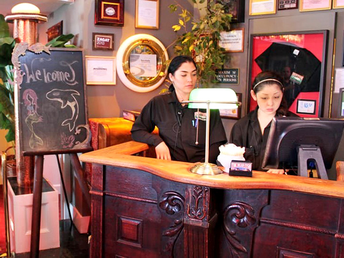 The host station welcomes you like an old friend's home, if that friend happened to have excellent taste in seafood and maritime decor.