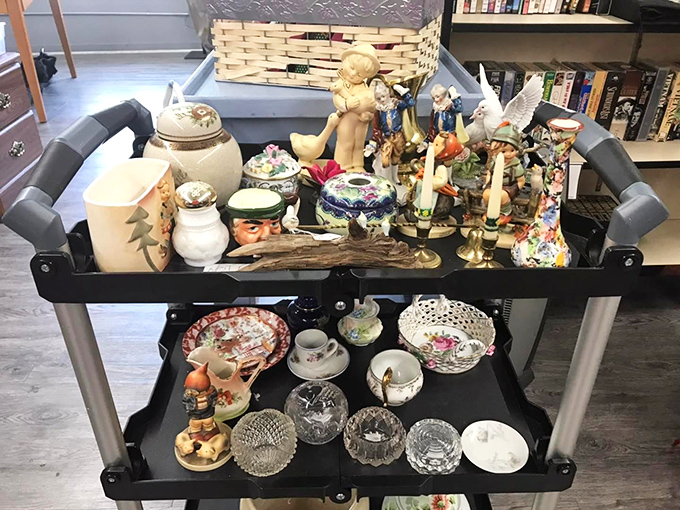 This cart of collectibles tells a hundred stories &ndash; each porcelain figurine and crystal dish waiting for its next chapter.