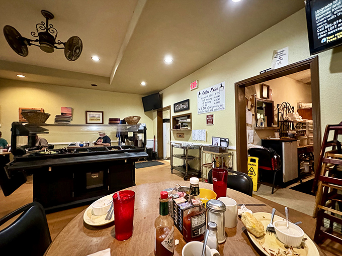 The dining area balances cozy and spacious, with ceiling fans that have been keeping things cool since before air conditioning was fashionable.
