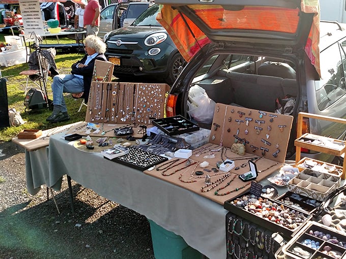 Jewelry displayed with loving care from the back of a car&mdash;proving the best boutiques sometimes have tailgates instead of fancy display cases.