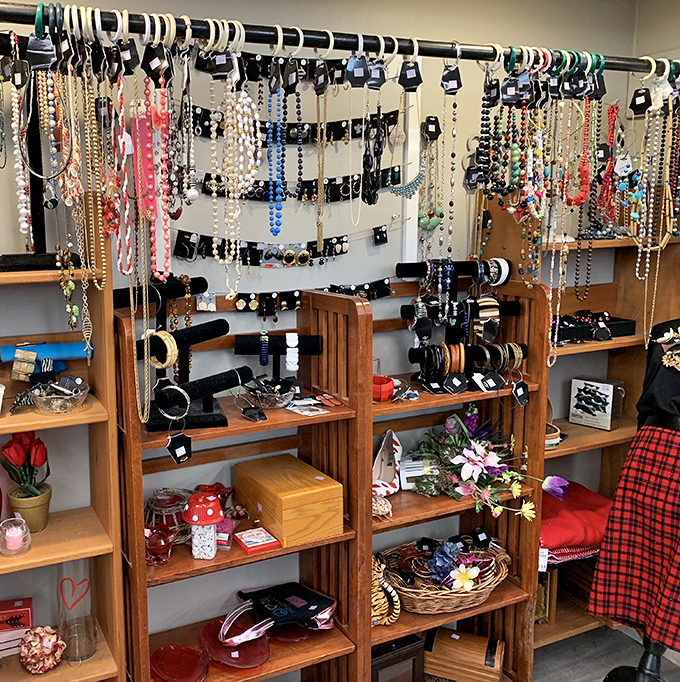 Jewelry displayed like an elegant treasure chest. Pearls, chains, and baubles waiting to adorn their next owner with stories of past glamour.