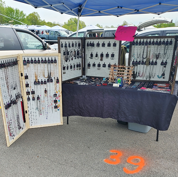 Jewelry display genius. This vendor's portable pegboard setup transforms a parking space into a boutique experience—retail ingenuity at its finest.