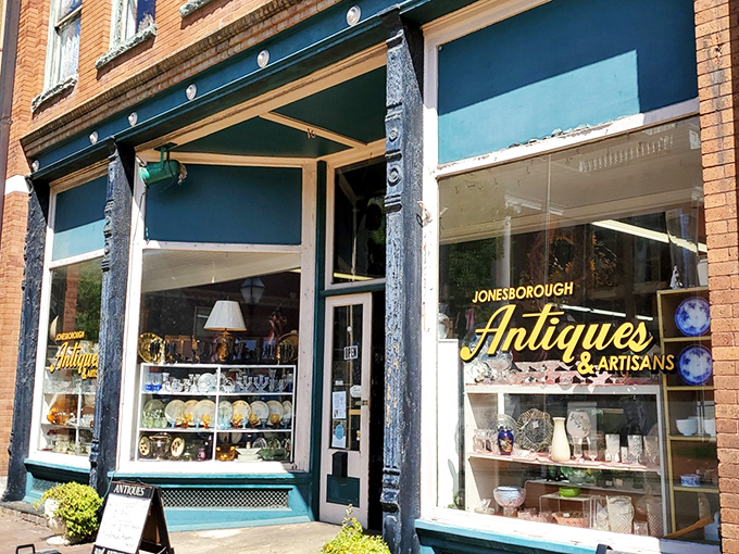 Jonesborough Antiques' window display tempts passersby with glimpses of yesterday's treasures, each item whispering stories of its former life.