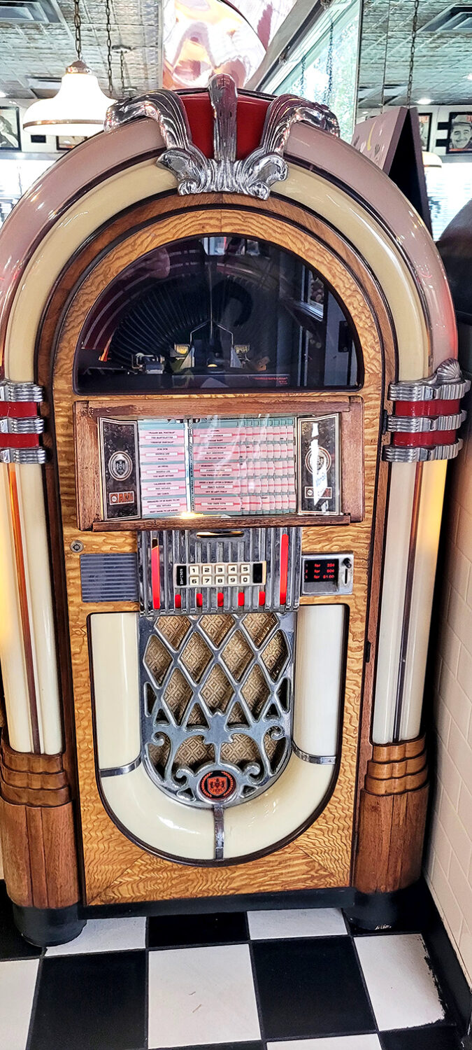 That jukebox isn't just playing songs&mdash;it's a time portal disguised as furniture. Push a button and suddenly you're dancing in another decade.