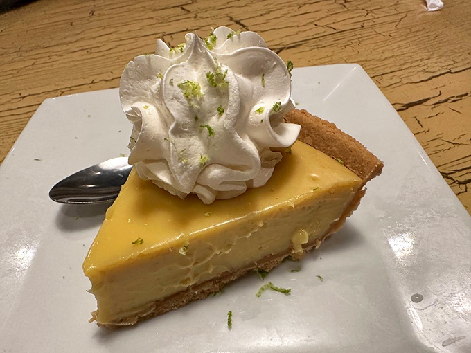 Key lime pie that hits the perfect balance between sweet and tart. That cloud of whipped cream on top? Heaven's little cushion.