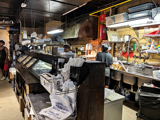 Where the magic happens&mdash;a working kitchen that prioritizes flavor over flash. No molecular gastronomy here, just generations of cooking wisdom.