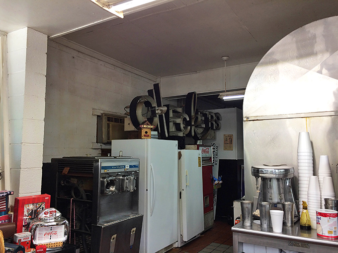 Behind the scenes where burger magic happens. No fancy equipment, just well-seasoned tools that know their purpose.