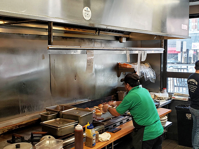 The kitchen dance &ndash; where cooks navigate tight quarters with the precision of choreography, turning simple ingredients into diner magic.