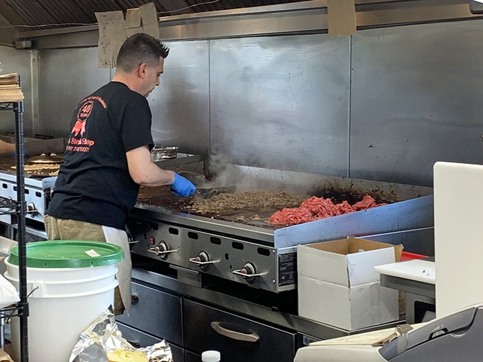 Where the magic happens—a grill that's seen more action than Rocky Balboa. That sizzle is the soundtrack of happiness.