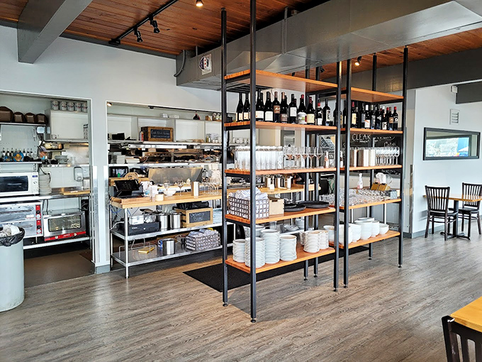 Open kitchen transparency lets you witness the magic while shelving displays organizational beauty in action.