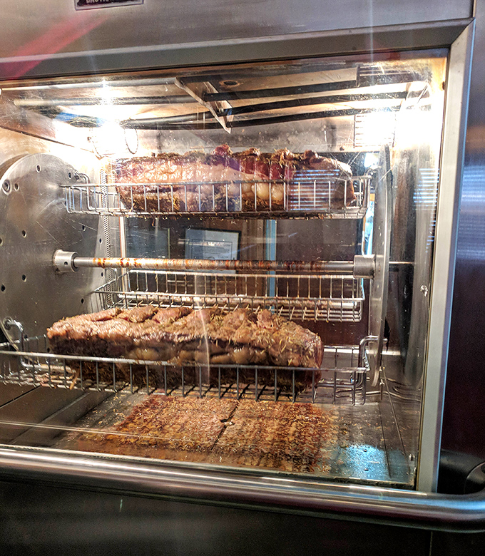 Behind this glass lies the magic &ndash; prime cuts of beef slowly roasting to juicy perfection in a carnivore's version of window shopping.