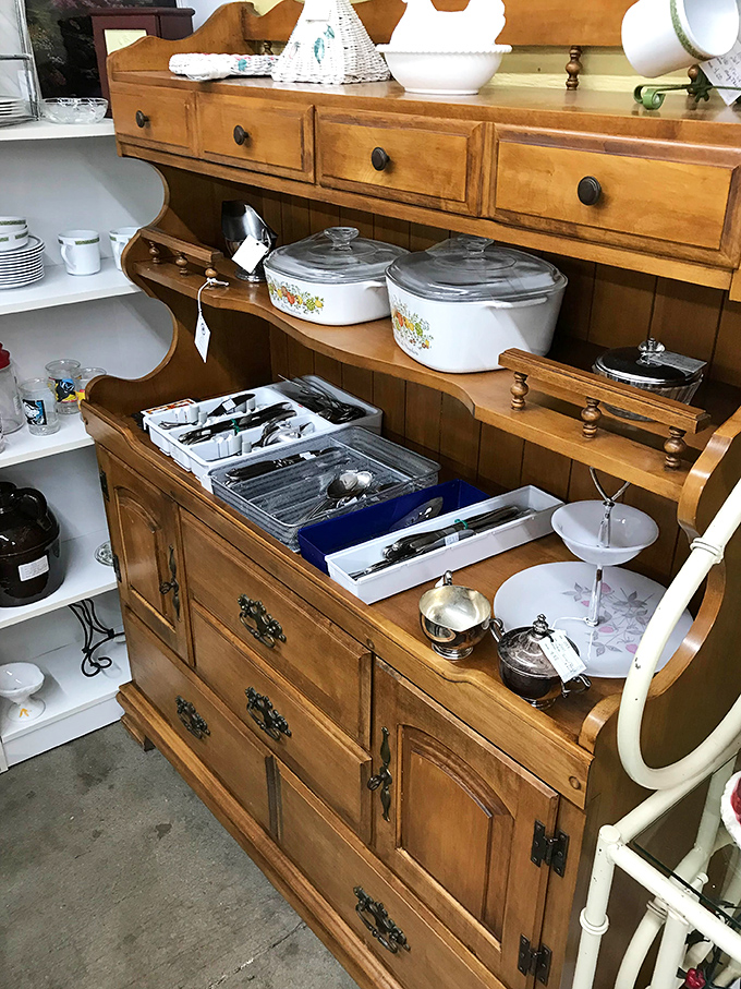 This honey-toned hutch isn't just furniture; it's a time capsule of family dinners and holiday gatherings waiting for its next chapter.