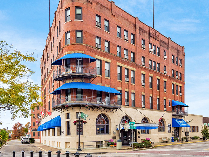 The Lafayette Hotel, with its distinctive blue awnings, isn't just accommodation&mdash;it's a character in Marietta's ongoing story, watching river life from the best seat in town.