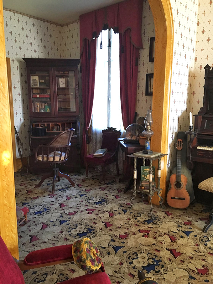 Victorian parlor perfection with floral carpets, period instruments, and enough antique furnishings to transport you back centuries.