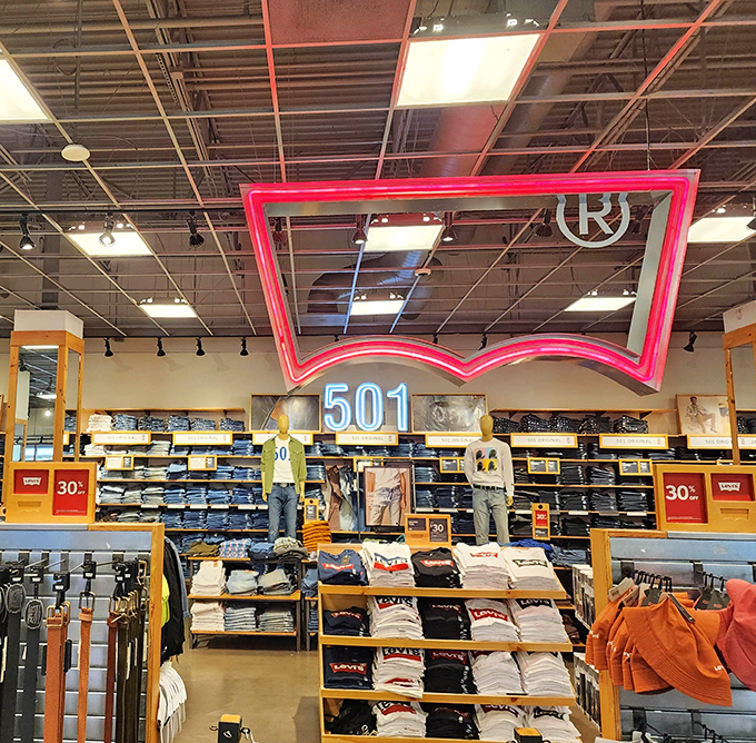 Levi's iconic red tab glows like a retail lighthouse, guiding denim enthusiasts to the promised land of perfectly priced 501s.