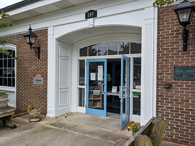 Behind this blue door lies Southport's literary heart. The local library proves that even in the digital age, nothing beats the analog pleasure of a good book.