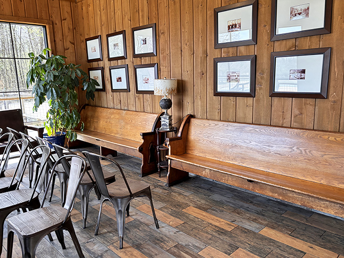 Church pew seating and framed memories create a waiting area that tells you this place values tradition as much as it does perfectly fried catfish.