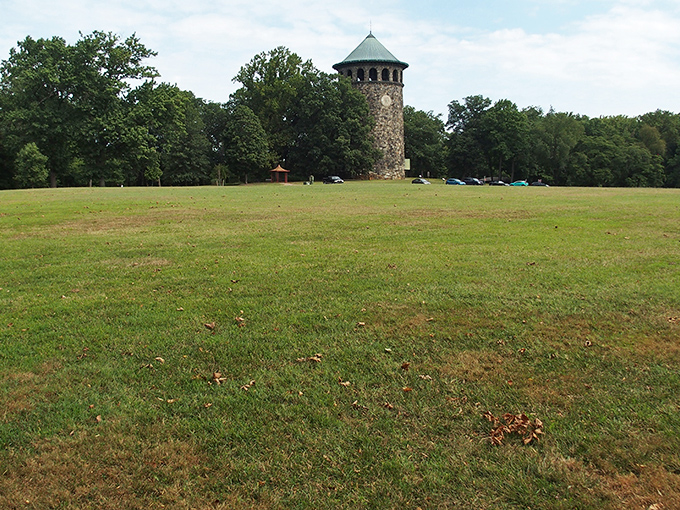 Standing alone in its grassy kingdom, the tower commands attention without saying a word. Some architecture just knows how to make an entrance.