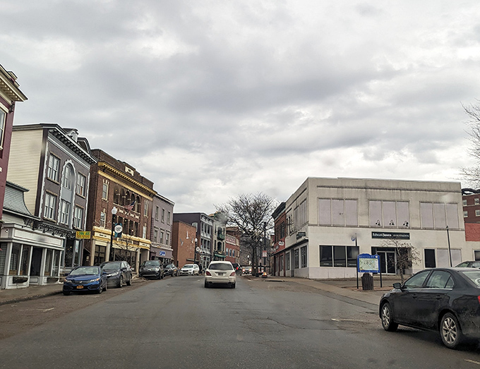 Main Street on a quiet afternoon. The kind of place where parallel parking is still considered an Olympic-worthy achievement.