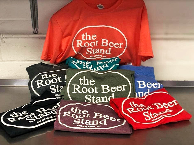 The merch wall proves you're not just visiting a restaurant but joining a community. That t-shirt is a badge of Michigan summer honor.