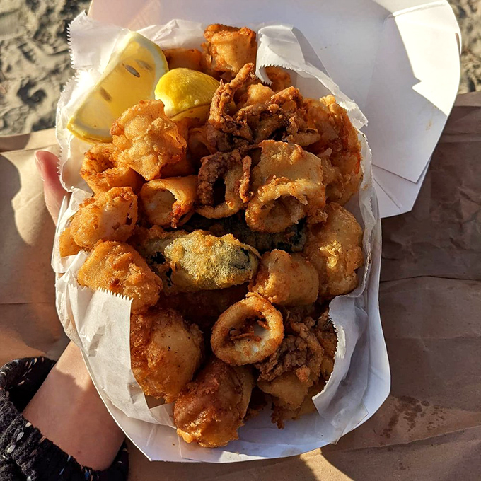 Mini fish trap tempura&mdash;bite-sized pieces of joy that prove sometimes the best seafood experiences come in small, perfectly crispy packages.
