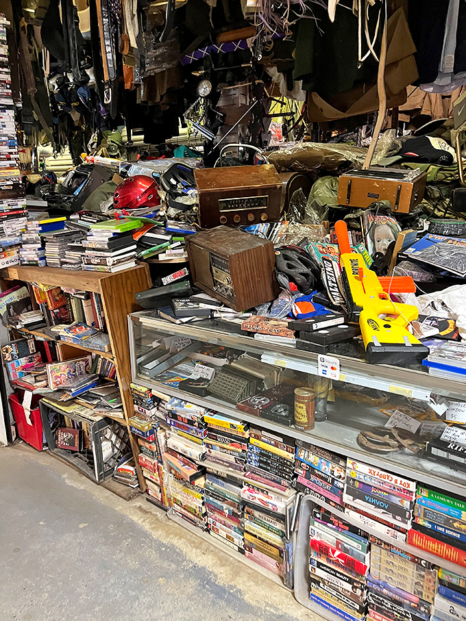 Organized chaos at its finest—vintage electronics, forgotten media, and nostalgic toys create a time capsule you can actually purchase from.